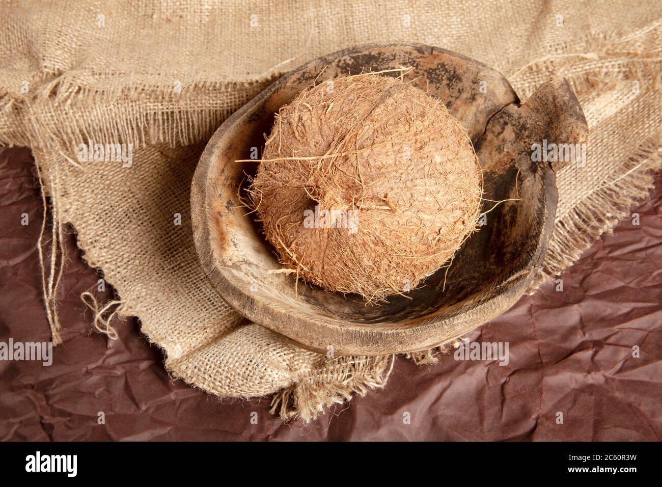 coconut in old antique wooden plate Stock Photo - Alamy