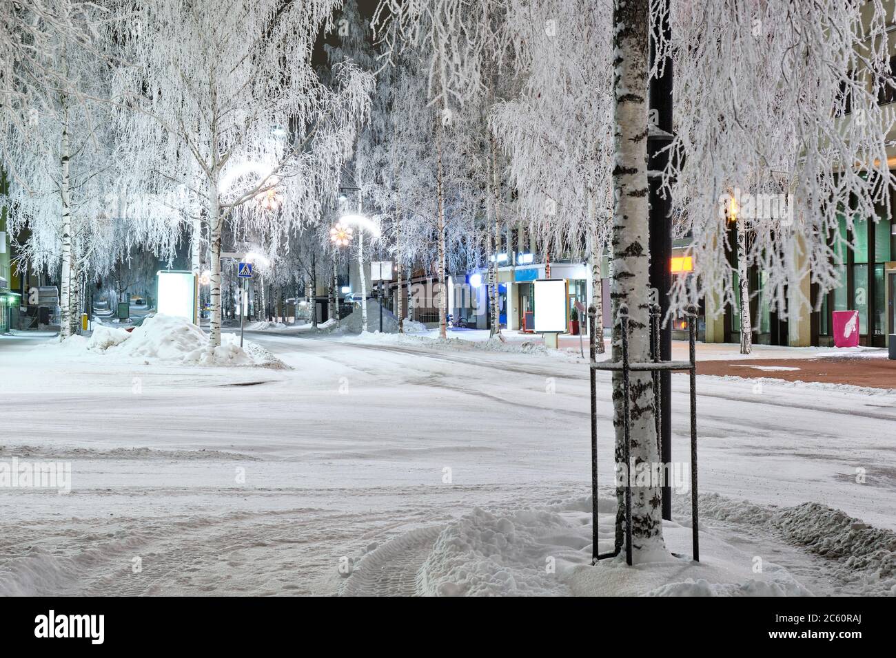 City street in winter in the bitter cold. Hoarfrost covered trees Stock ...