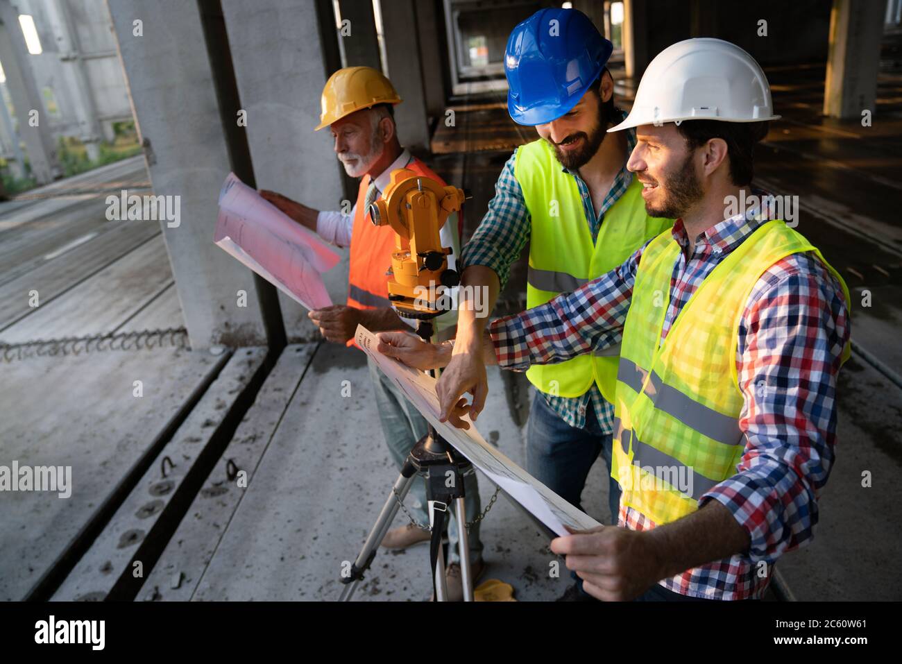 Engineer, contractor, architect teamwork. Construction people talking ...