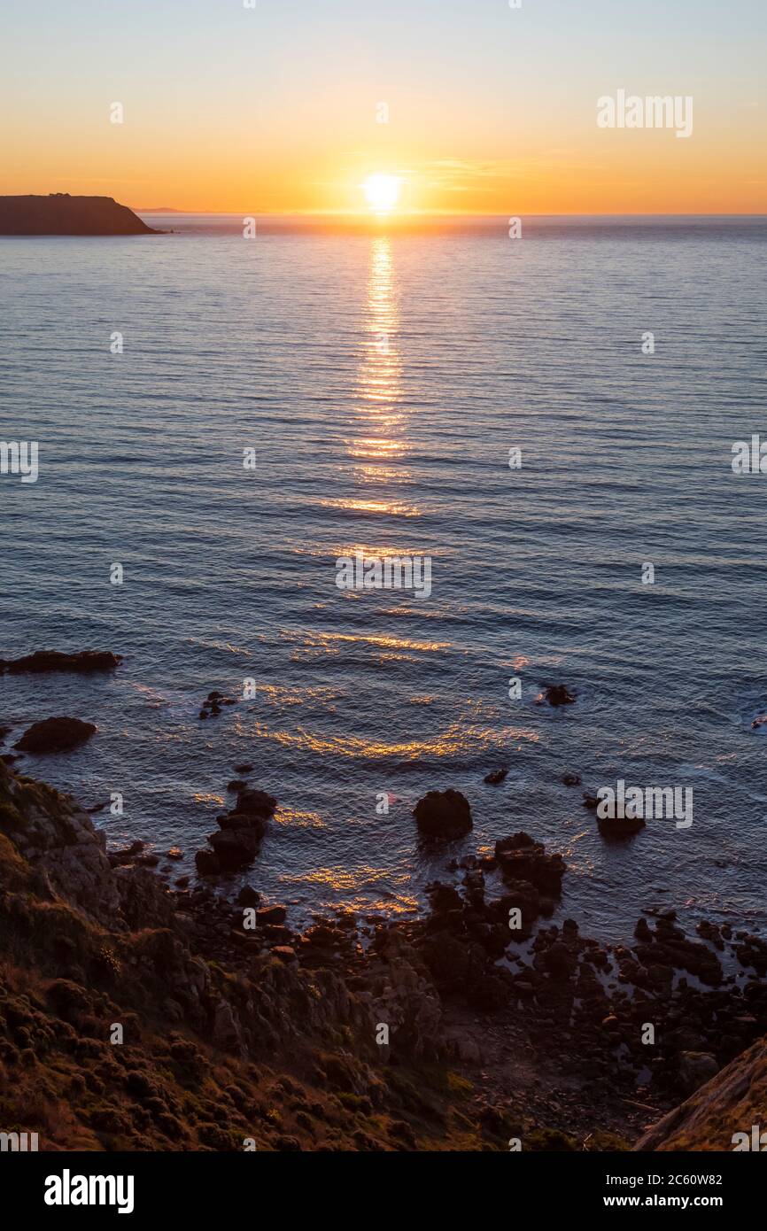Sunset over Mana Island and Cook Strait, Titahi Bay, Porirua ...
