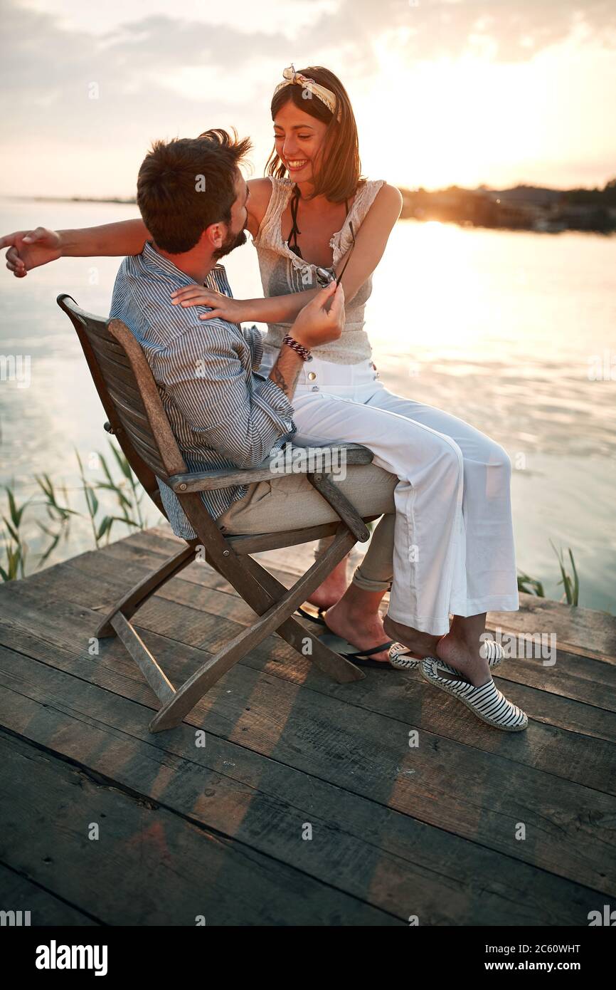 Man hugging woman sunrise hi-res stock photography and images - Alamy
