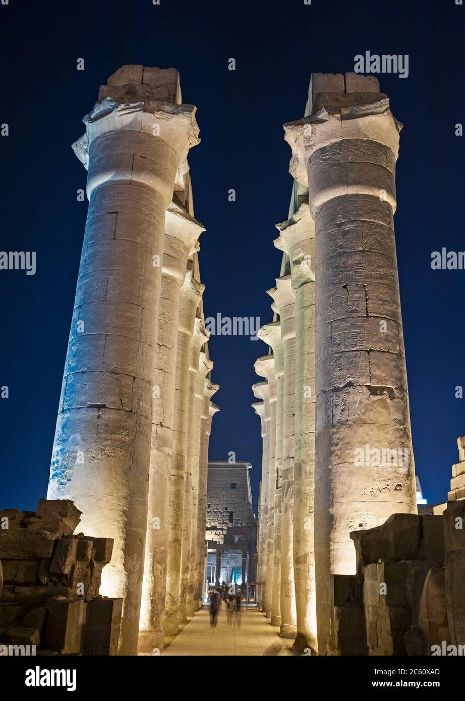 Large columns in hypostyle hall at ancient egyptian Luxor Temple lit up ...