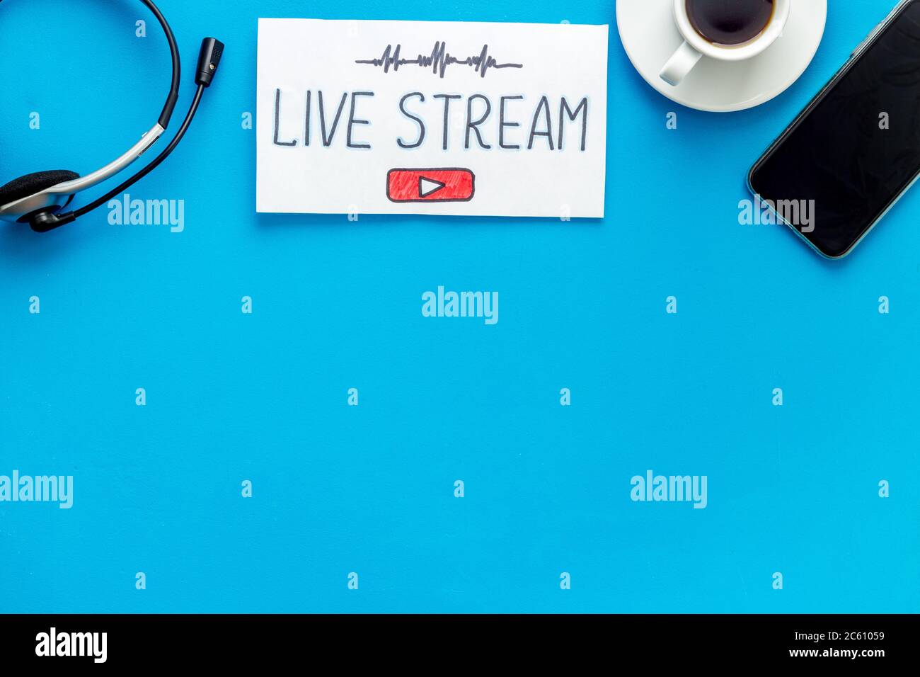 Online streaming social media concept. Paper tablet on office desk top ...