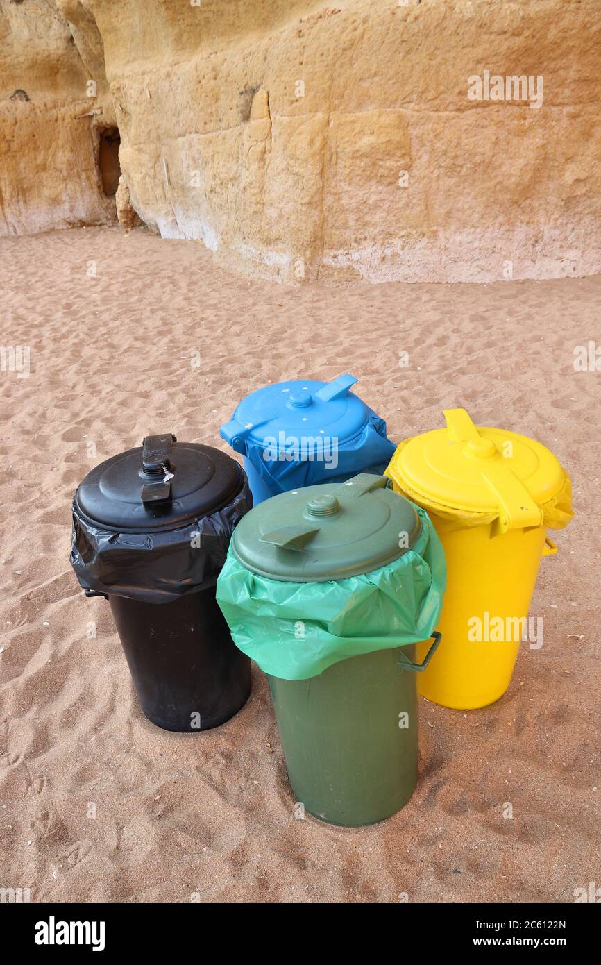 Europe recycling concept. Garbage sorting containers at a public beach ...