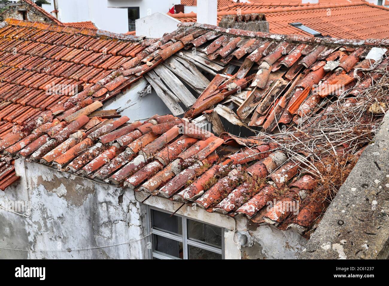 Collapsed roof tiles hi-res stock photography and images - Alamy