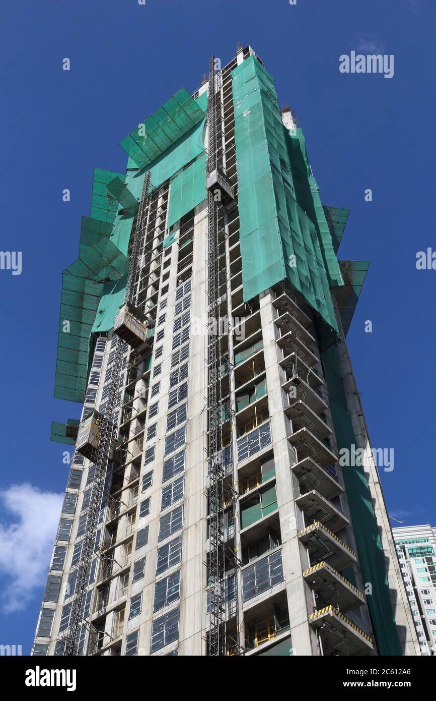 Office building construction - generic city skyscraper development in ...