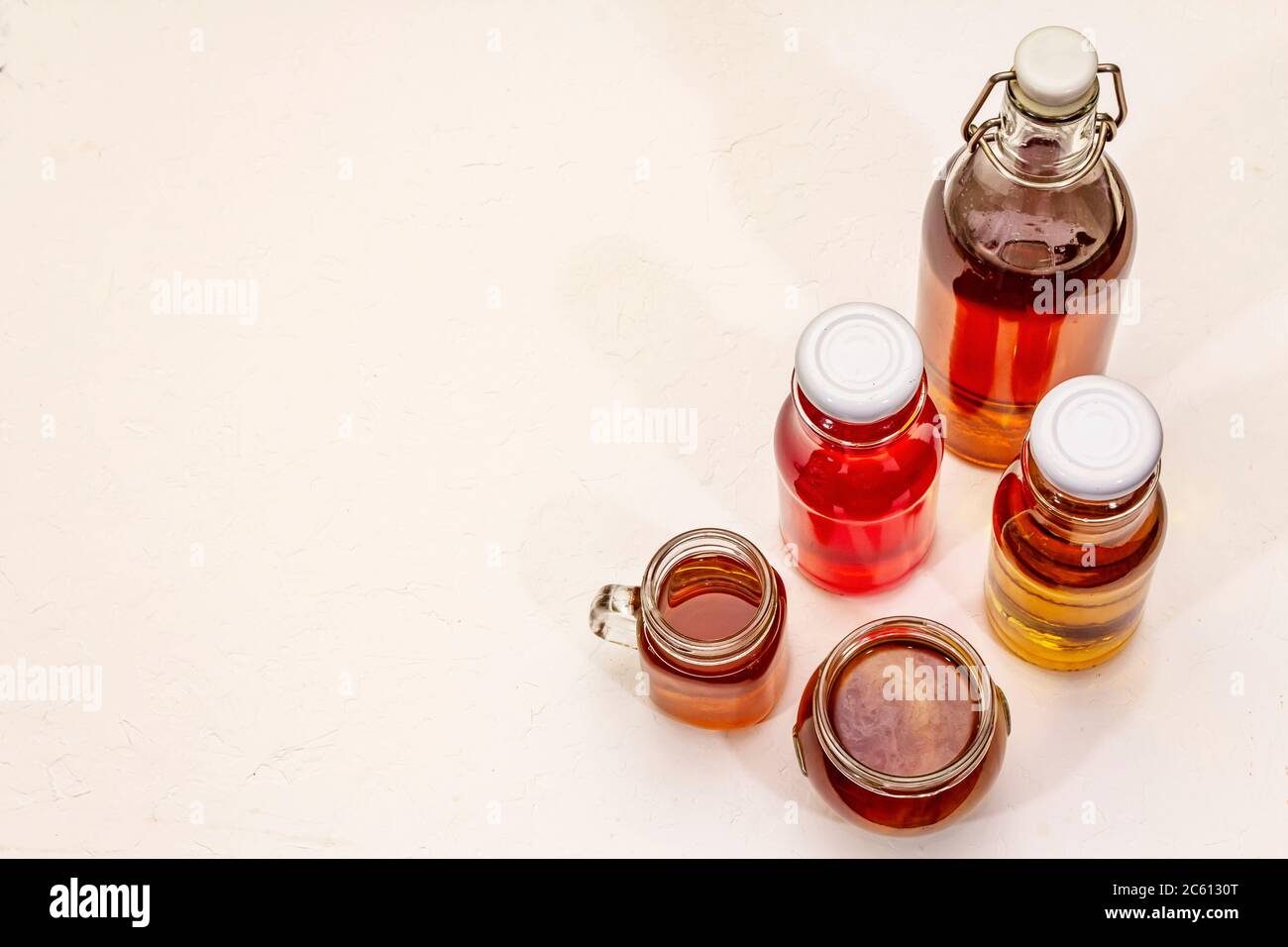 Kombucha in glass bottles. Set of different flavors. Healthy fermented ...