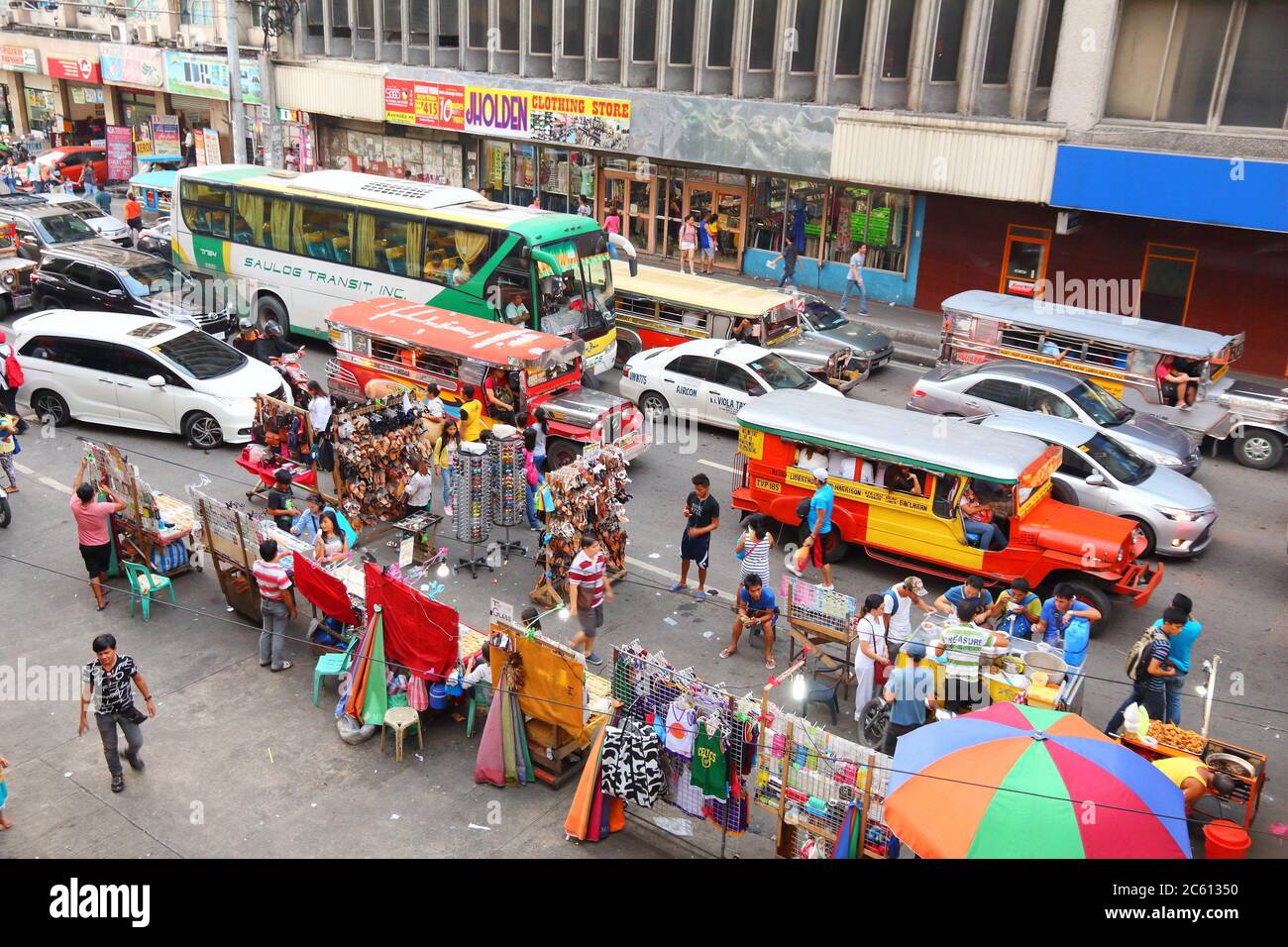 MANILA, PHILIPPINES - NOVEMBER 25, 2017: People drive in heavy traffic ...