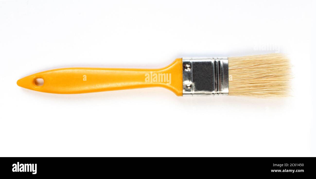 Yellow paintbrush isolated on white background. Paint brush above Stock ...