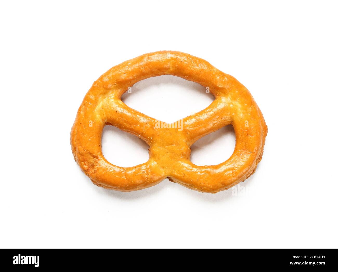 A single pretzel isolated on white background. Salty brown snack top ...