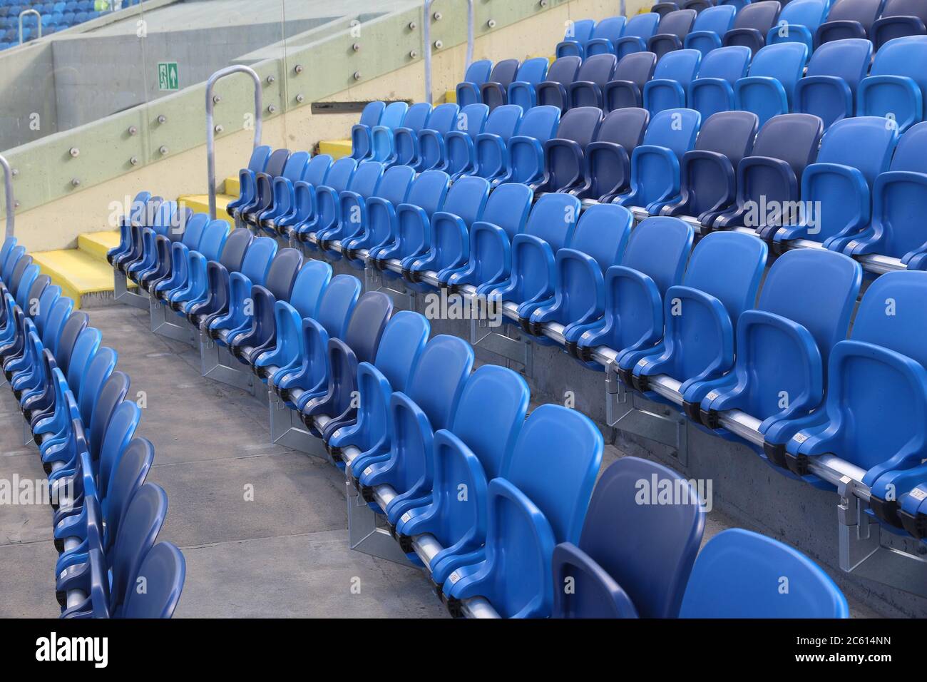 Stadium seats - empty sports venue. Blue plastic chairs Stock Photo - Alamy