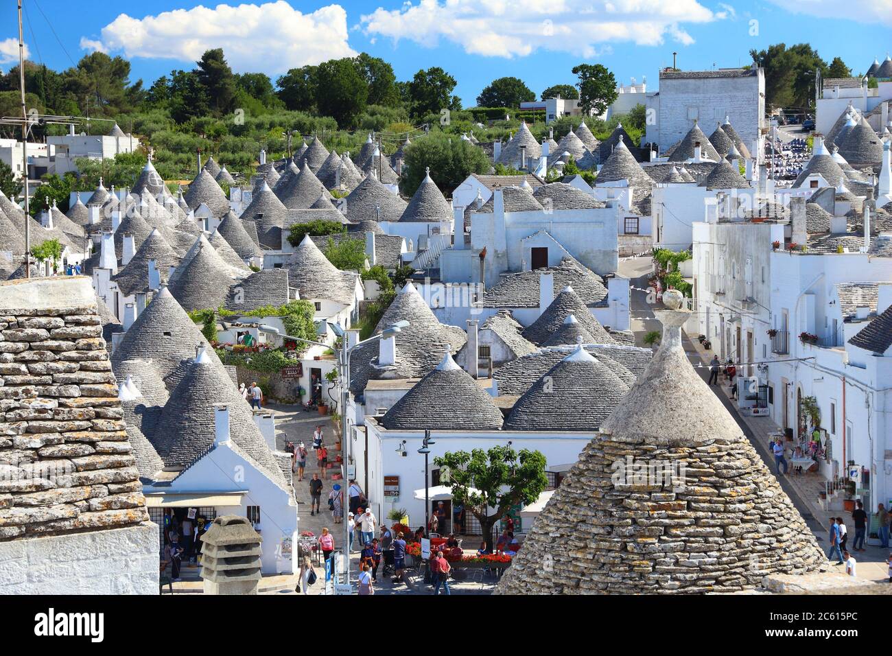 ALBEROBELLO, ITALY - MAY 29, 2017: People visit Alberobello, Italy ...