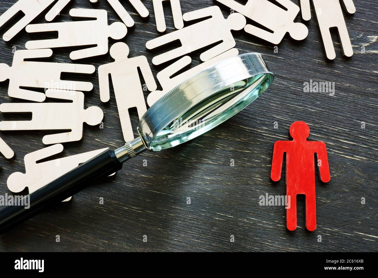 Human resource management and talent choice. Magnifying glass and ...