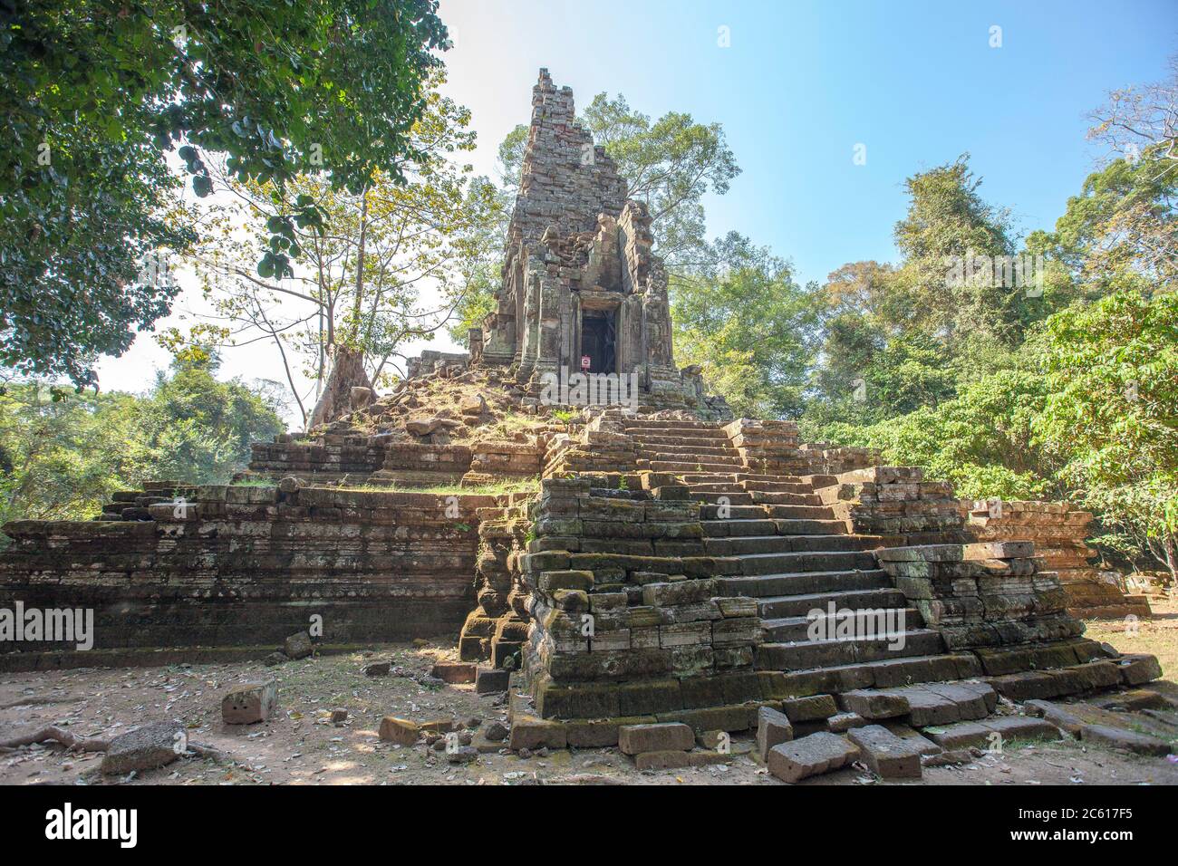 Ancient Preah Palilay temple in Angkor Thom and huge Banyan trees ...