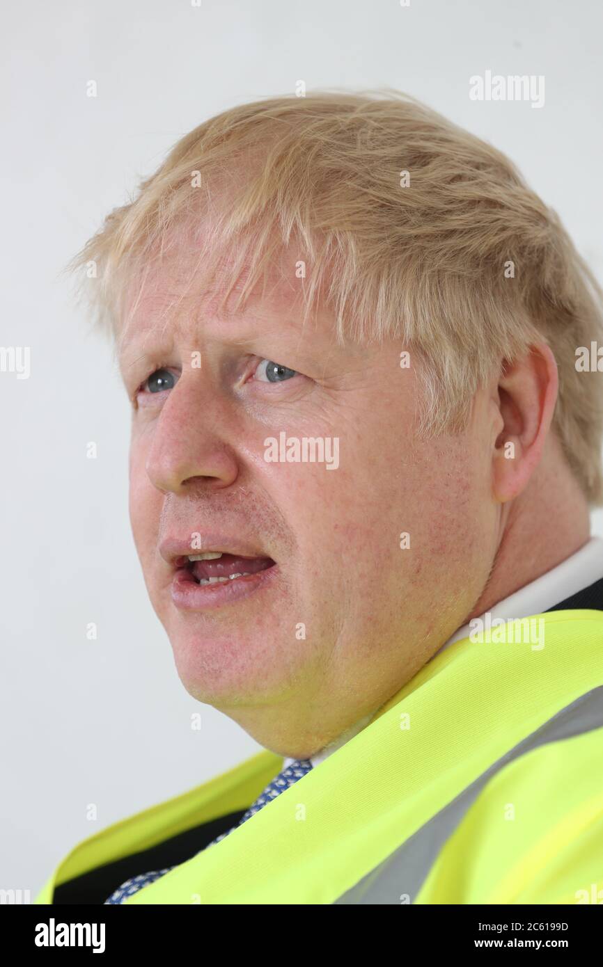 Prime Minister Boris Johnson, sporting a new haircut, during a visit to ...