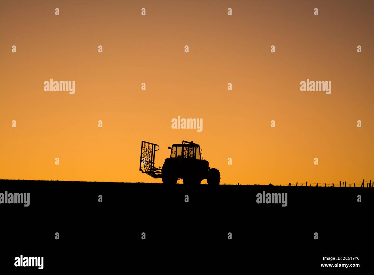 Agricultural tractor sunset hi-res stock photography and images - Alamy