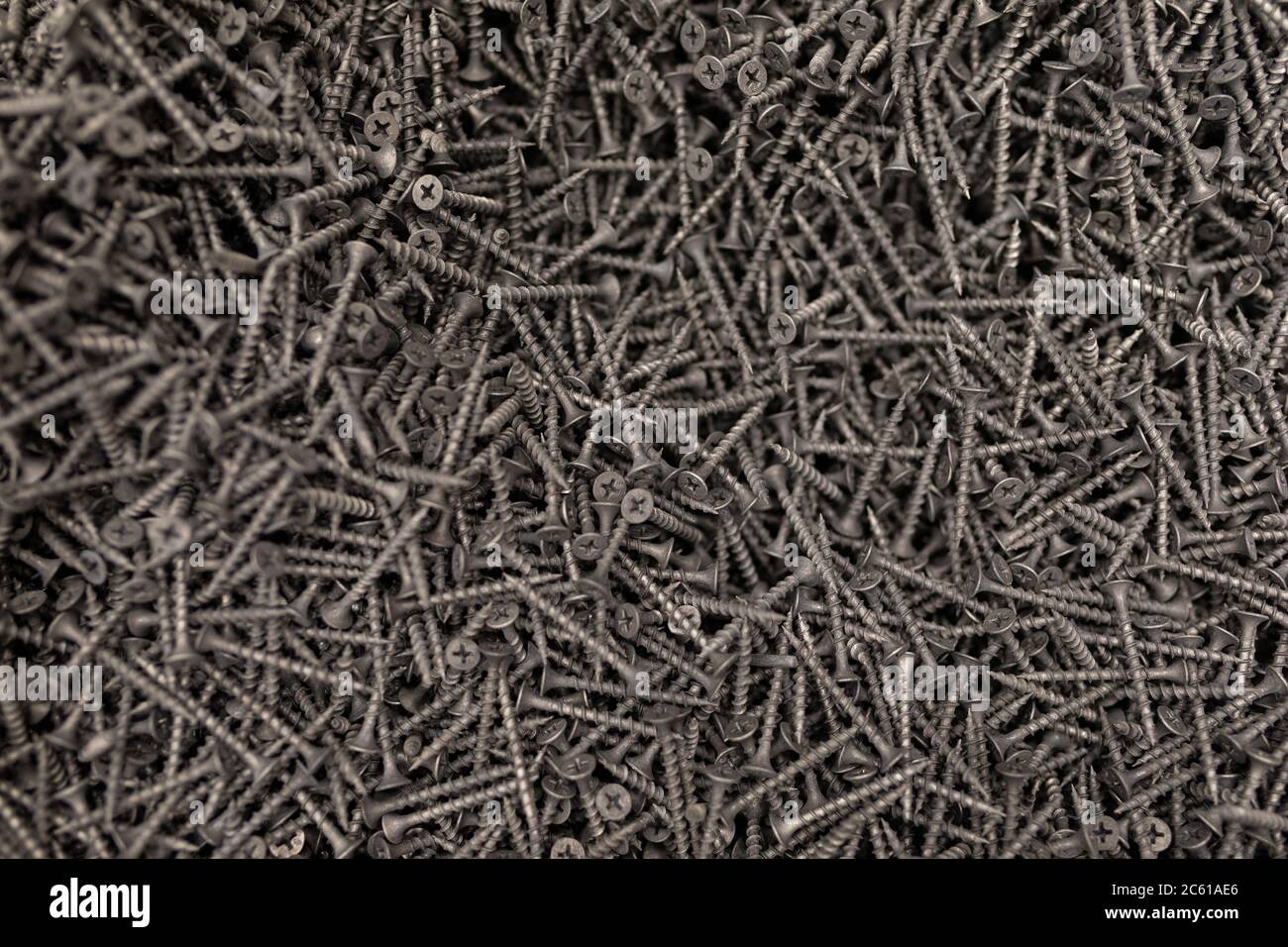 pile of screws close up, hardware store Stock Photo - Alamy