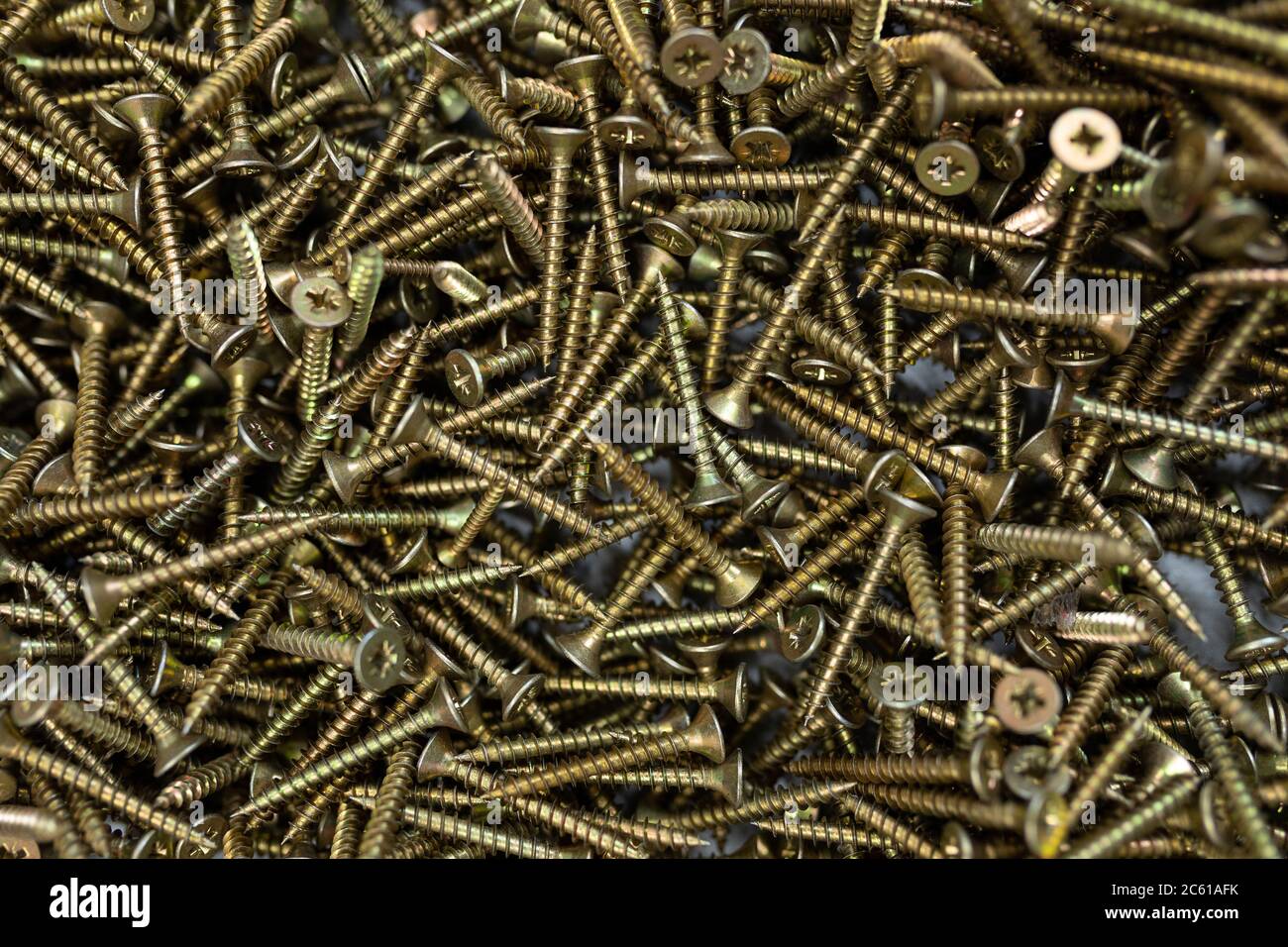 pile of screws close up, hardware store Stock Photo - Alamy