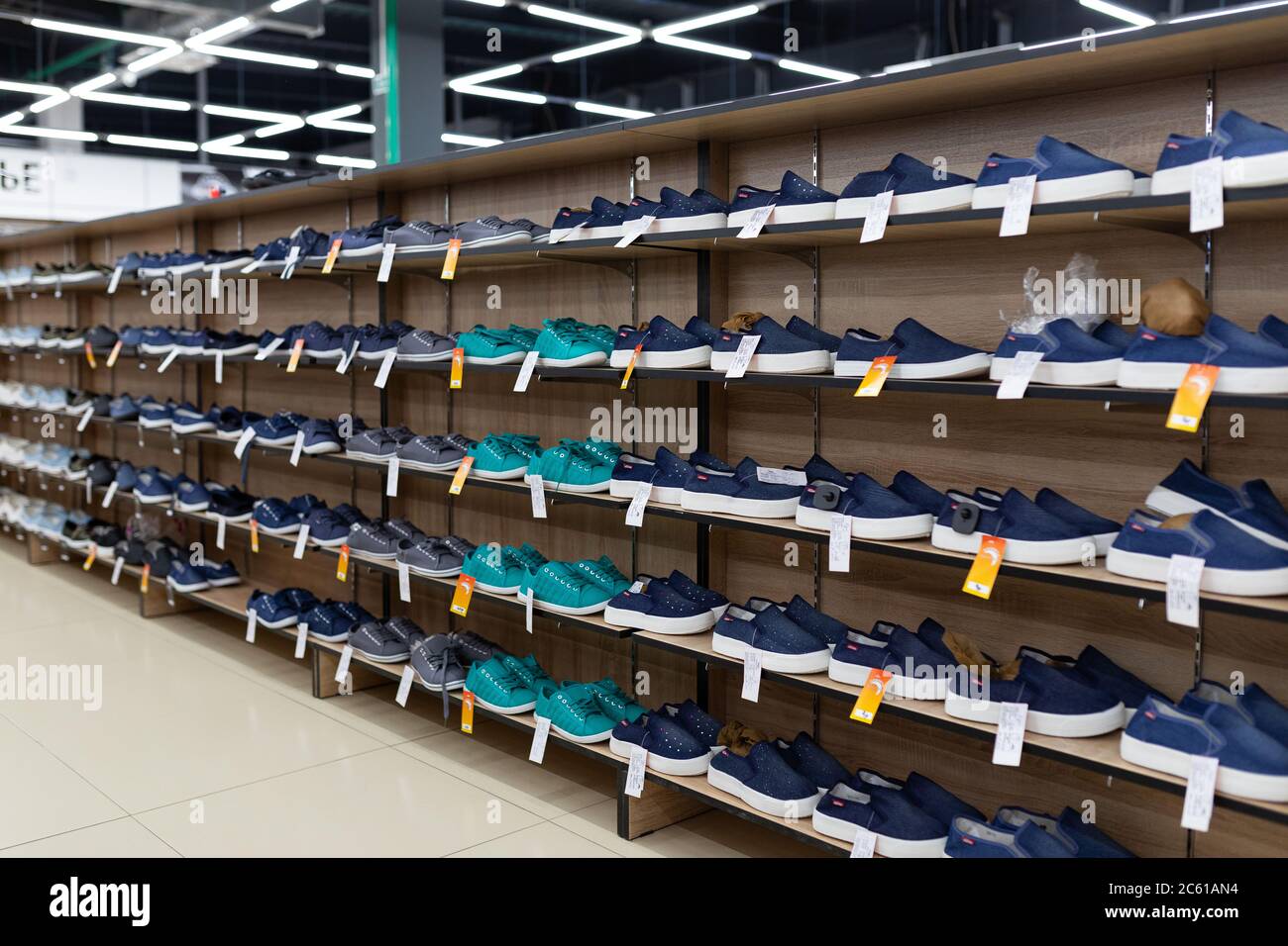 Trainer on shoes rack hi-res stock photography and images - Alamy