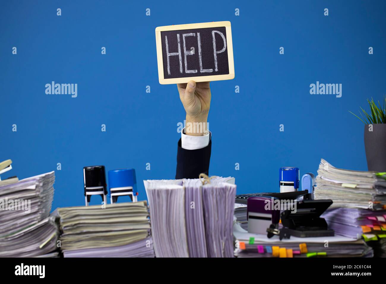 Hand of overworked caucasian businessman asking for help holding ...