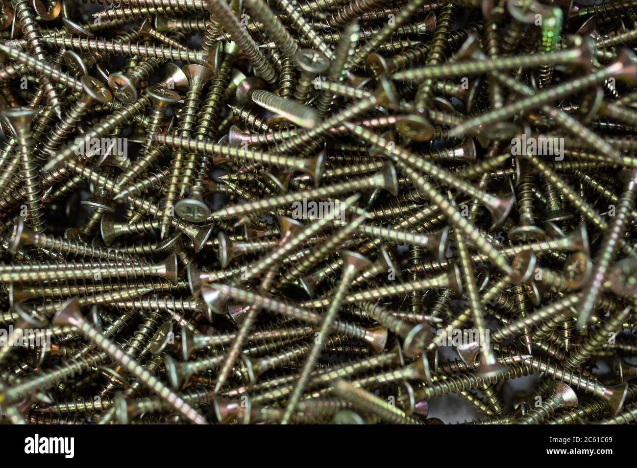 pile of screws close up, hardware store Stock Photo - Alamy