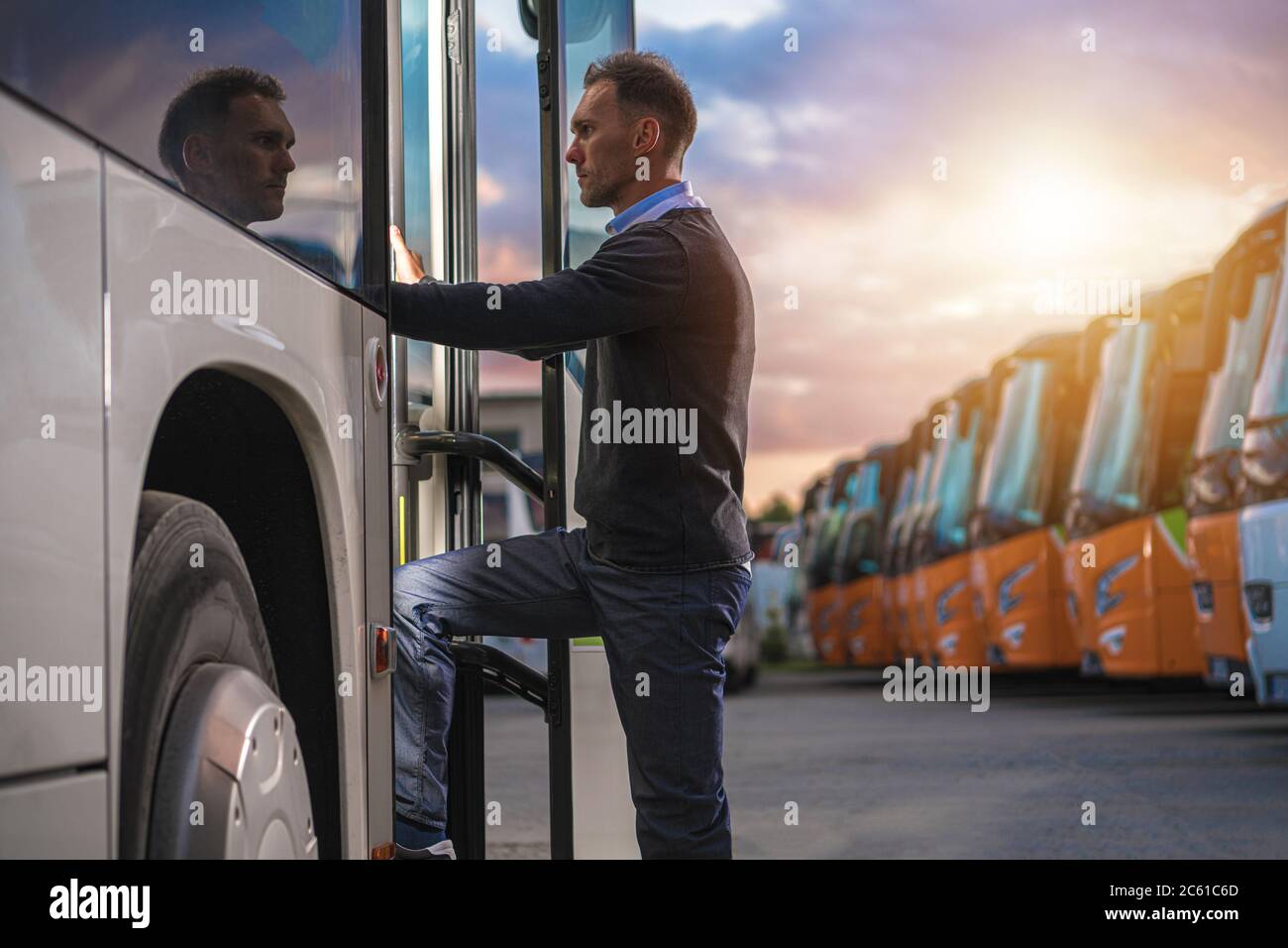 Caucasian Male Passenger in His 40s Getting Into Public Shuttle Bus on ...
