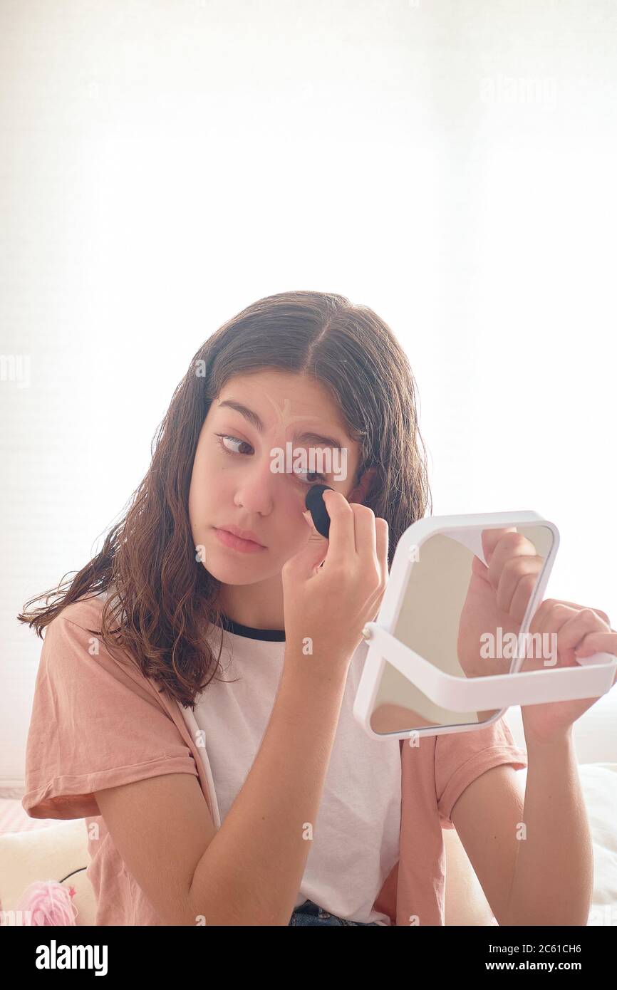 Applying powder to nose hi-res stock photography and images - Alamy