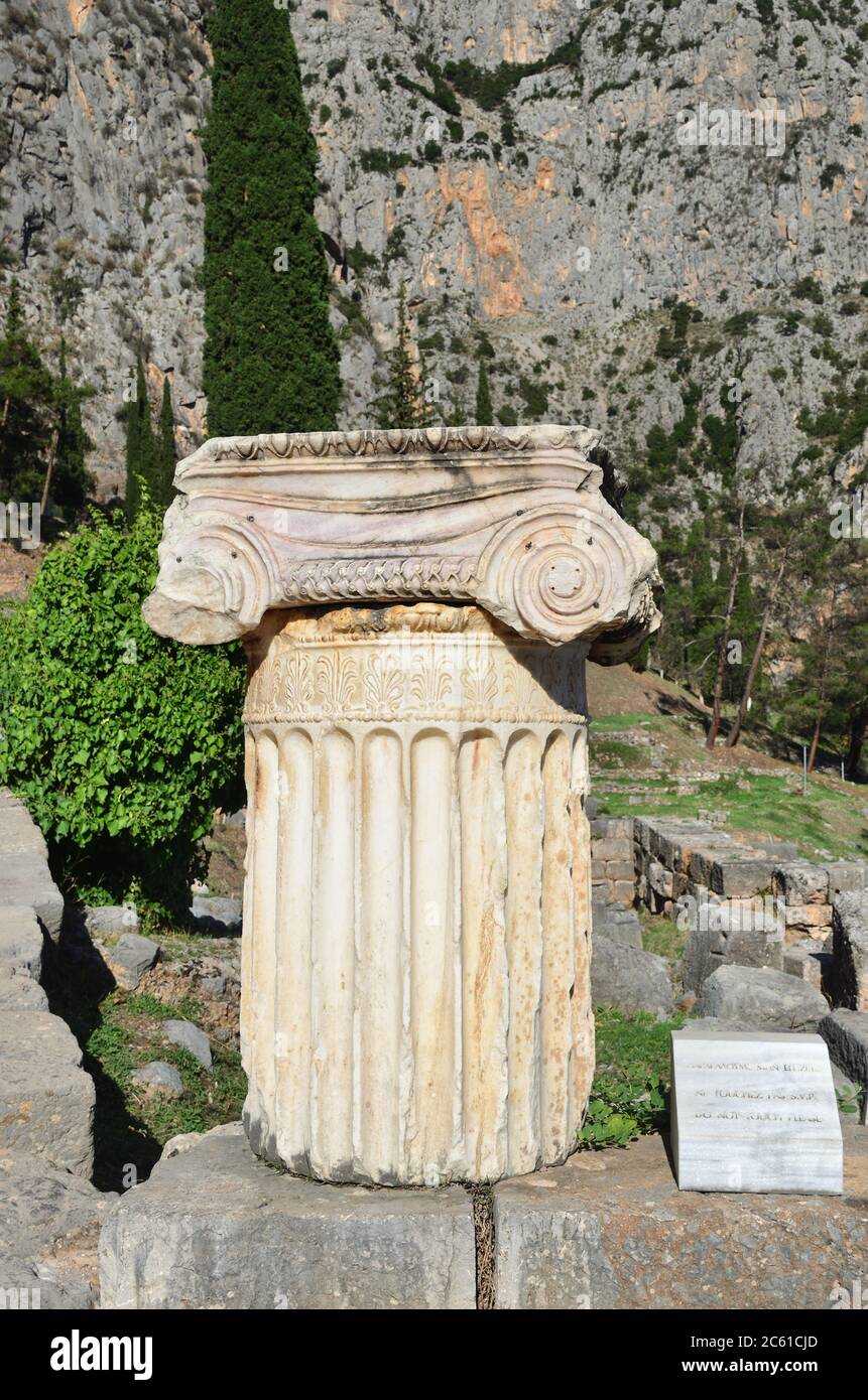 Ancient marble column in Ancient Greek archaeological site of Delphi ...