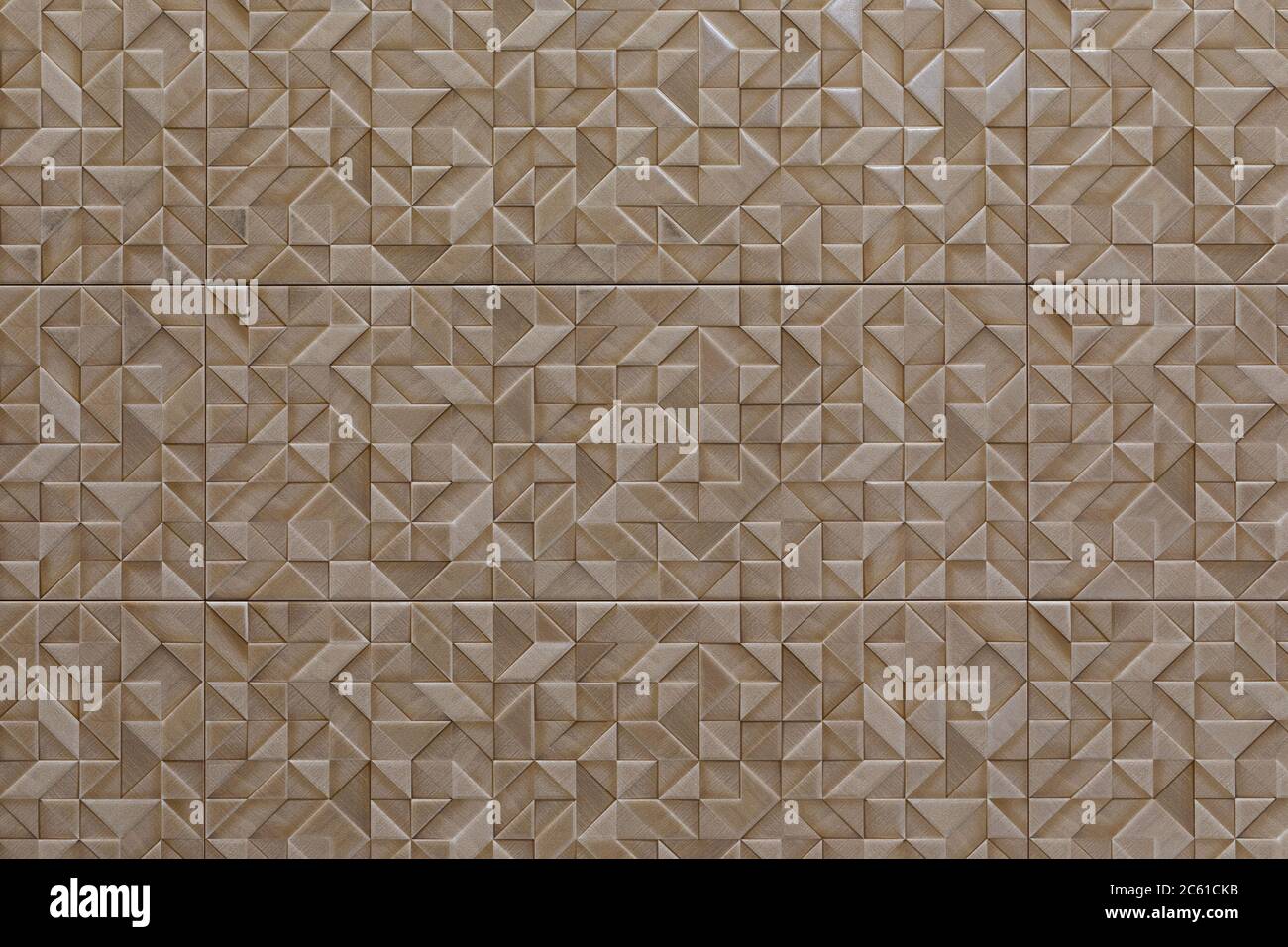 ceramic tiles with mosaic patterns of different colors close-up ...
