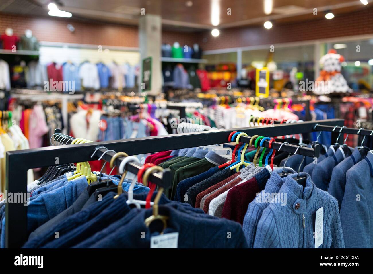 department store with a large assortment of clothes Stock Photo - Alamy