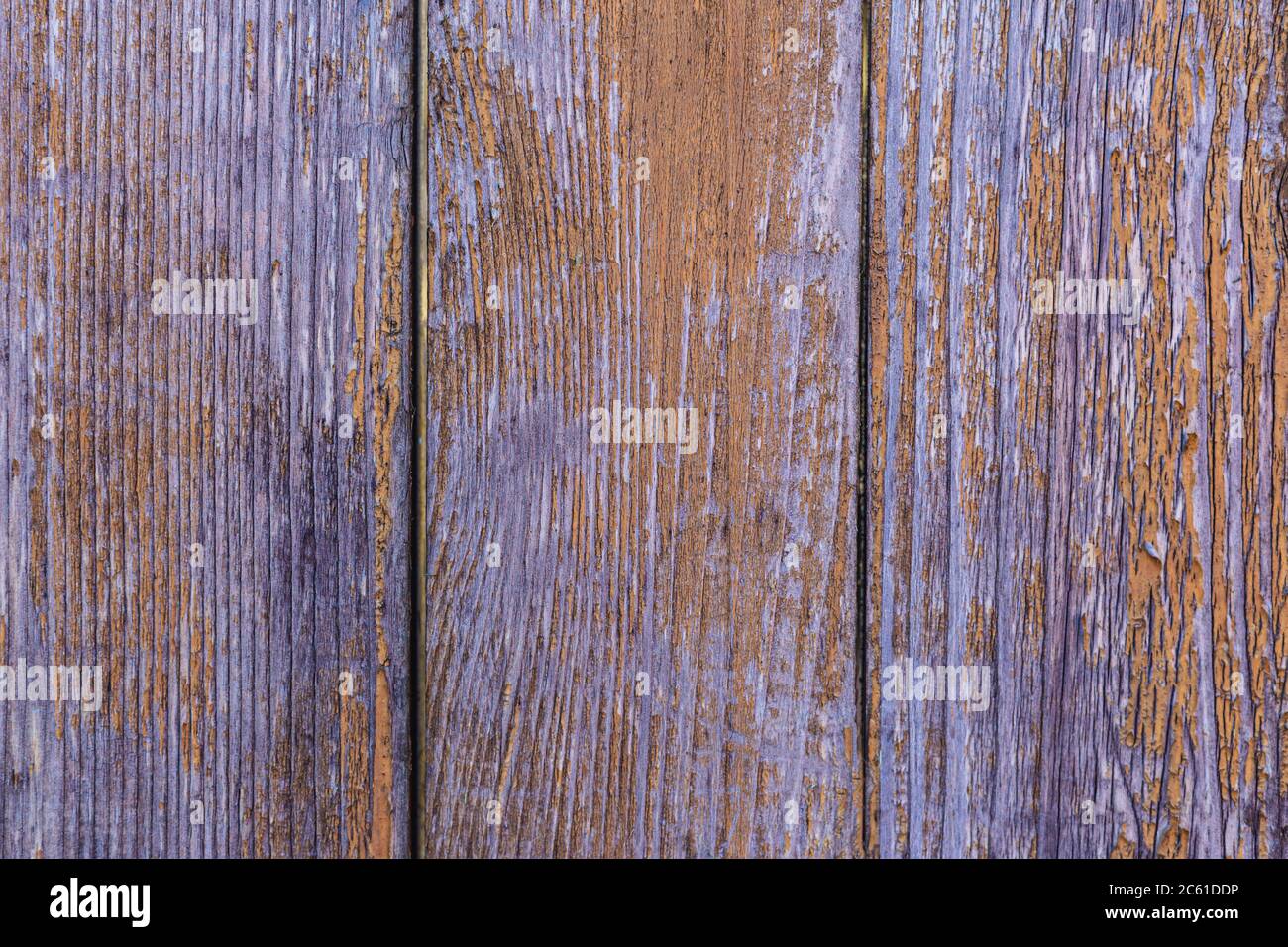 Rustic wood texture or background with scratched multi-colored paint ...