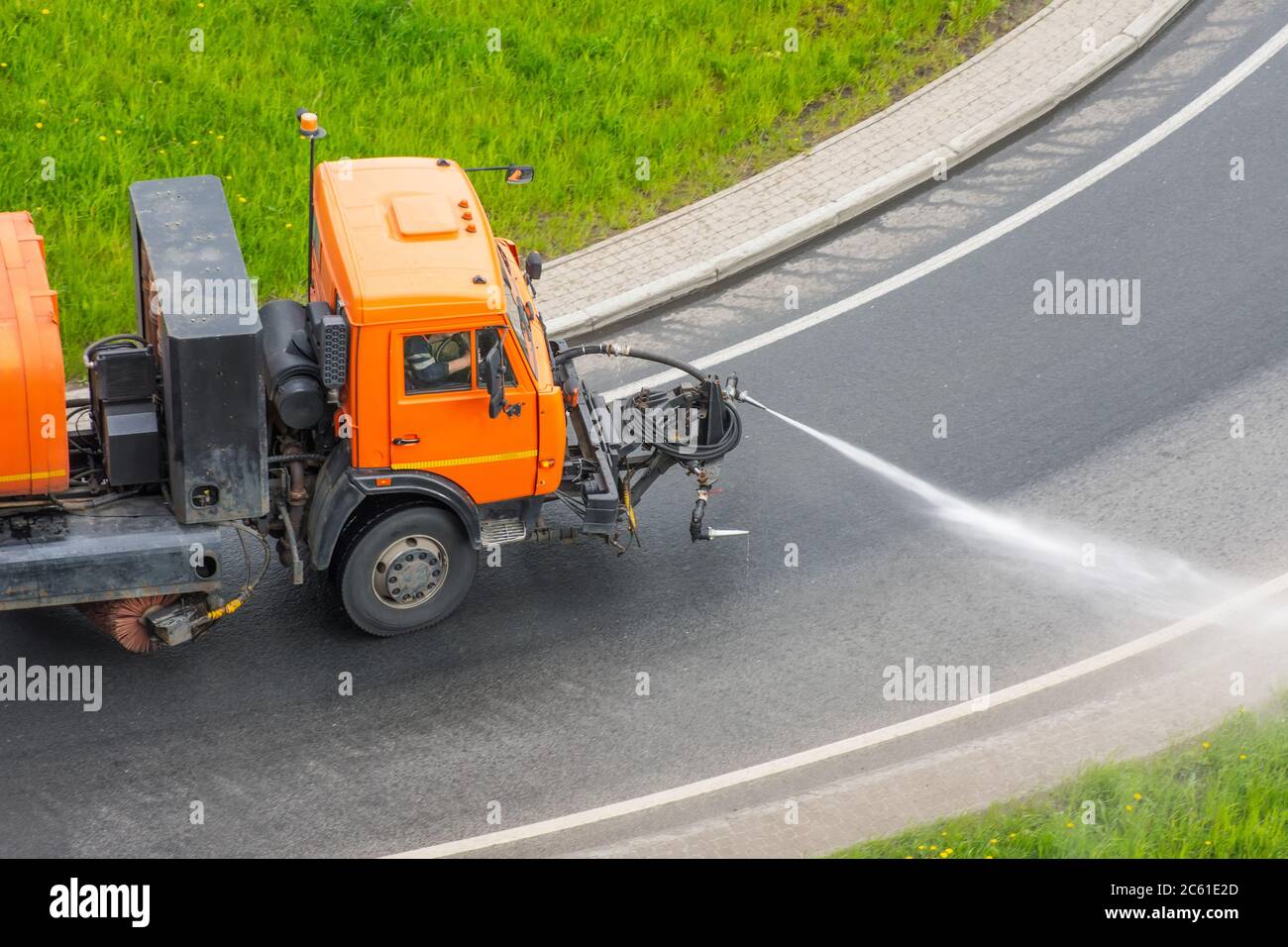 Machines wash asphalt hi-res stock photography and images - Alamy