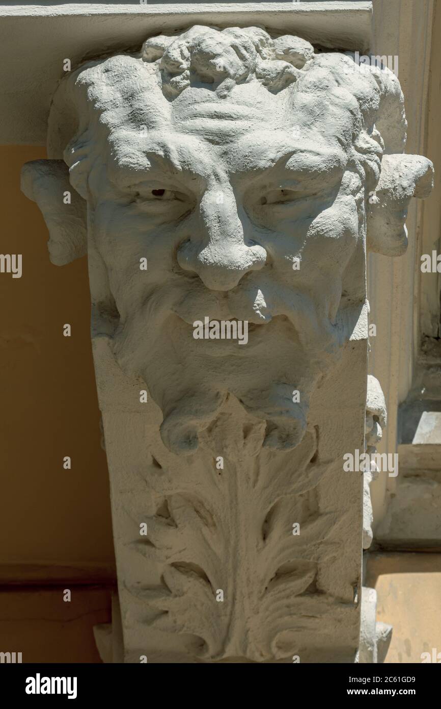 Architecture building ceramic face portrait art decor Stock Photo - Alamy