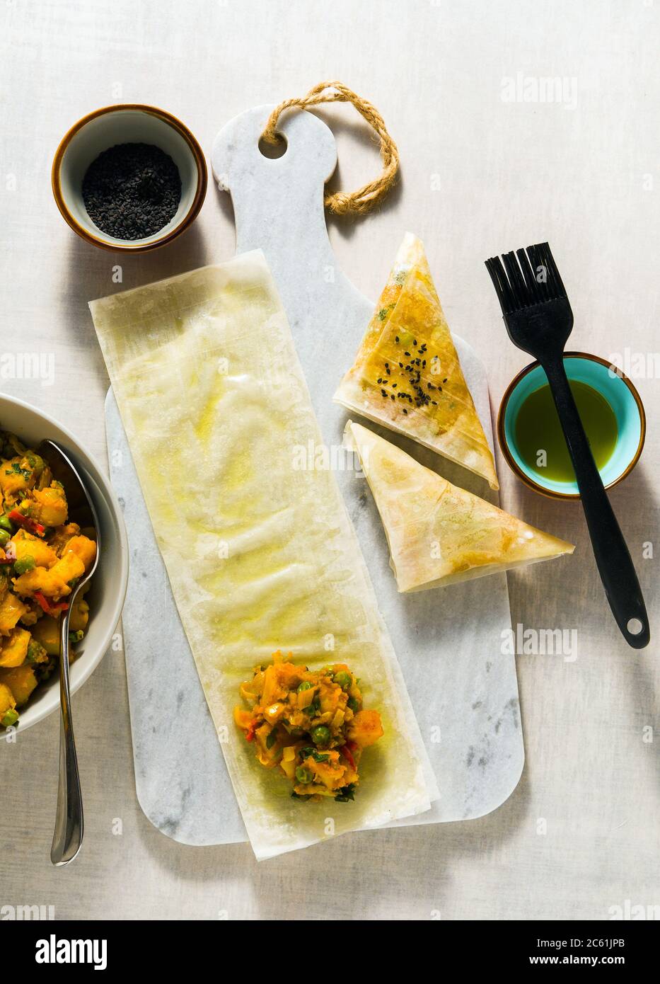 step by step recipe of indian samosa made with phyllo with spicy ...