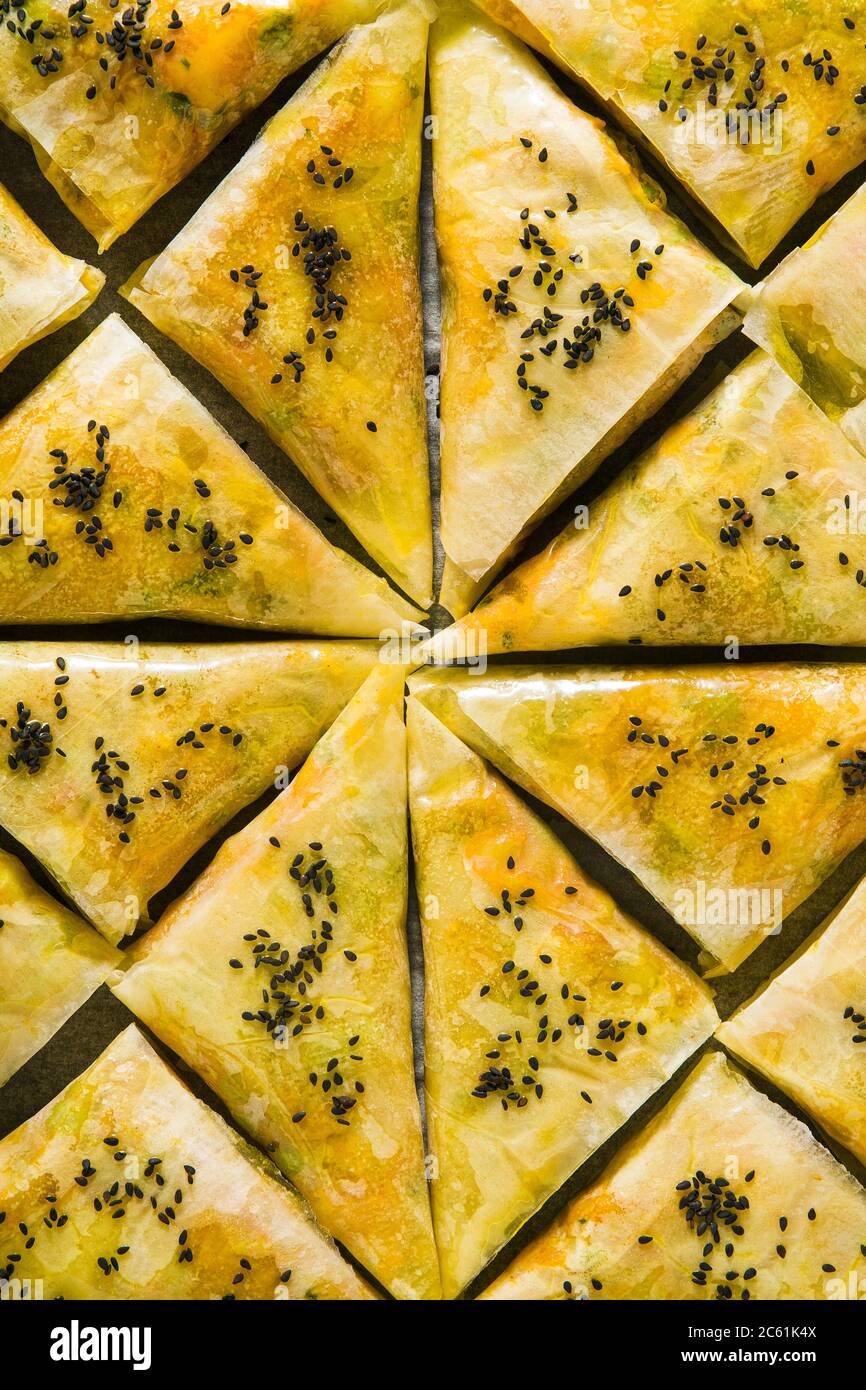 indian samosa made with phyllo with spicy potatoes and vegetables on a ...