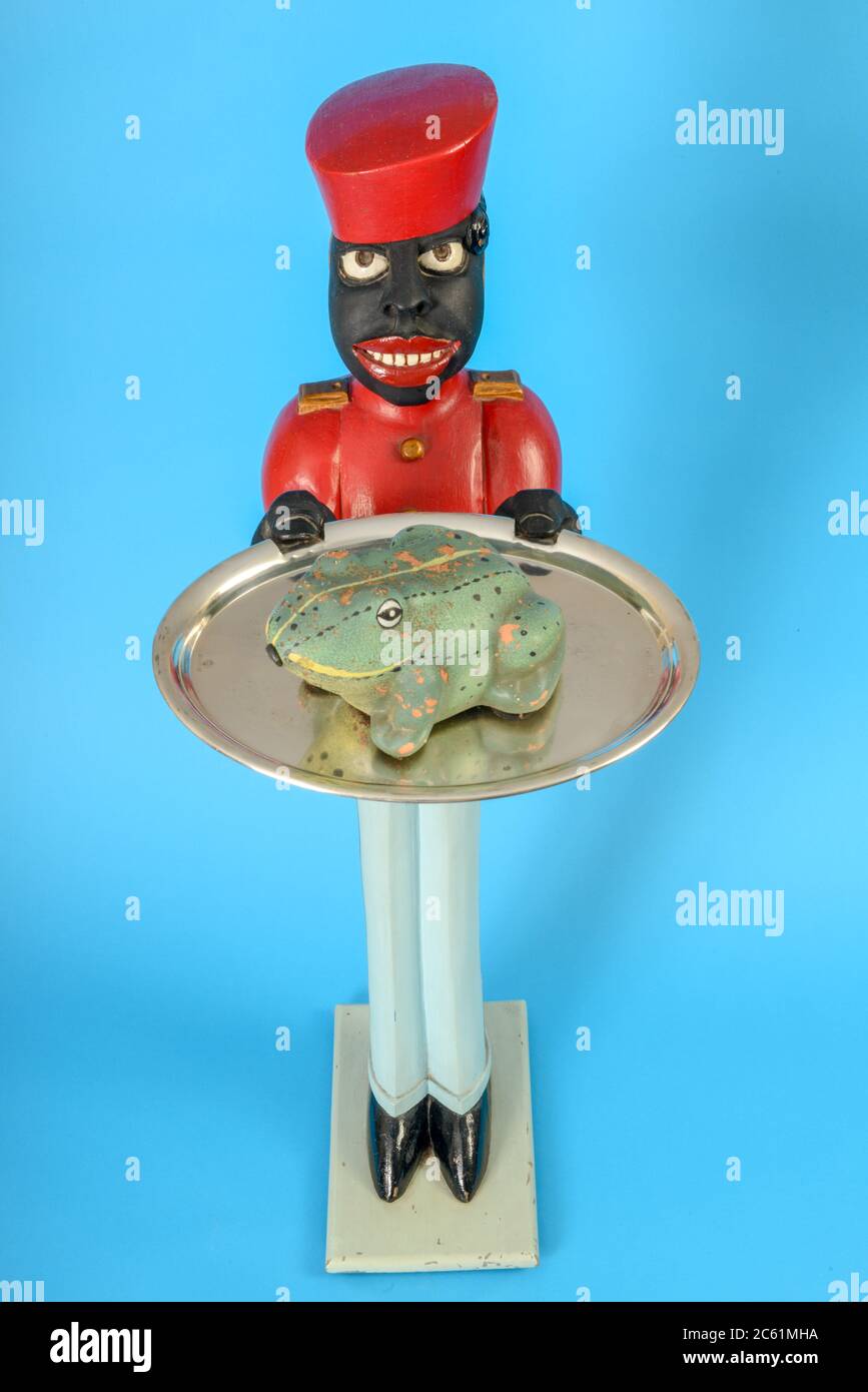 Statue of a black servant with a frog on a tray Stock Photo - Alamy