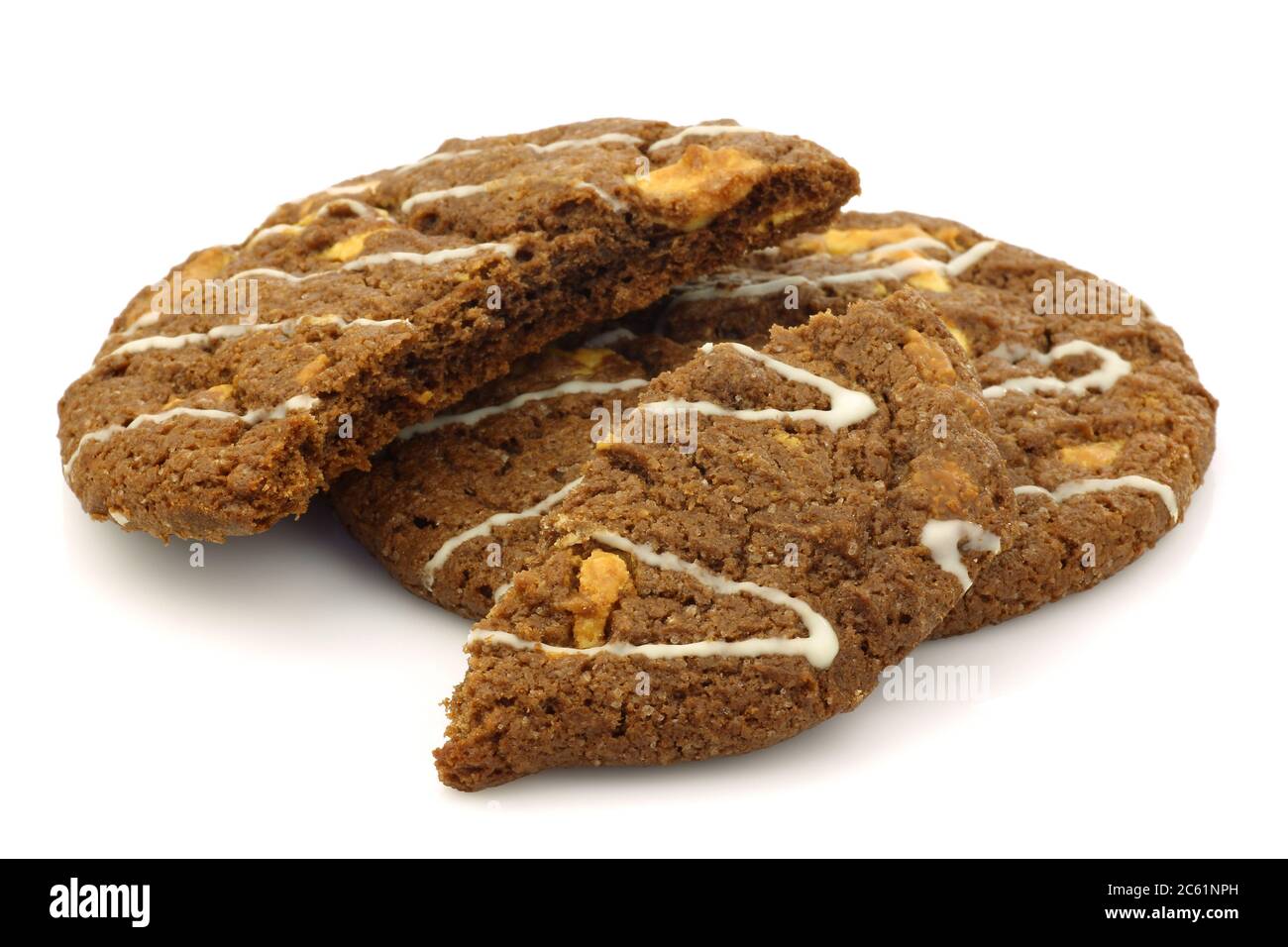 Crunchy chocolate chip cookies with nuts decorated with white chocolate ...
