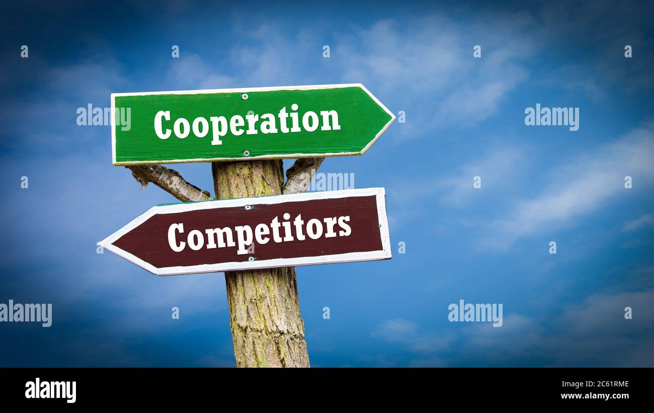 Street Sign the Direction Way to Cooperation versus Competitors Stock ...