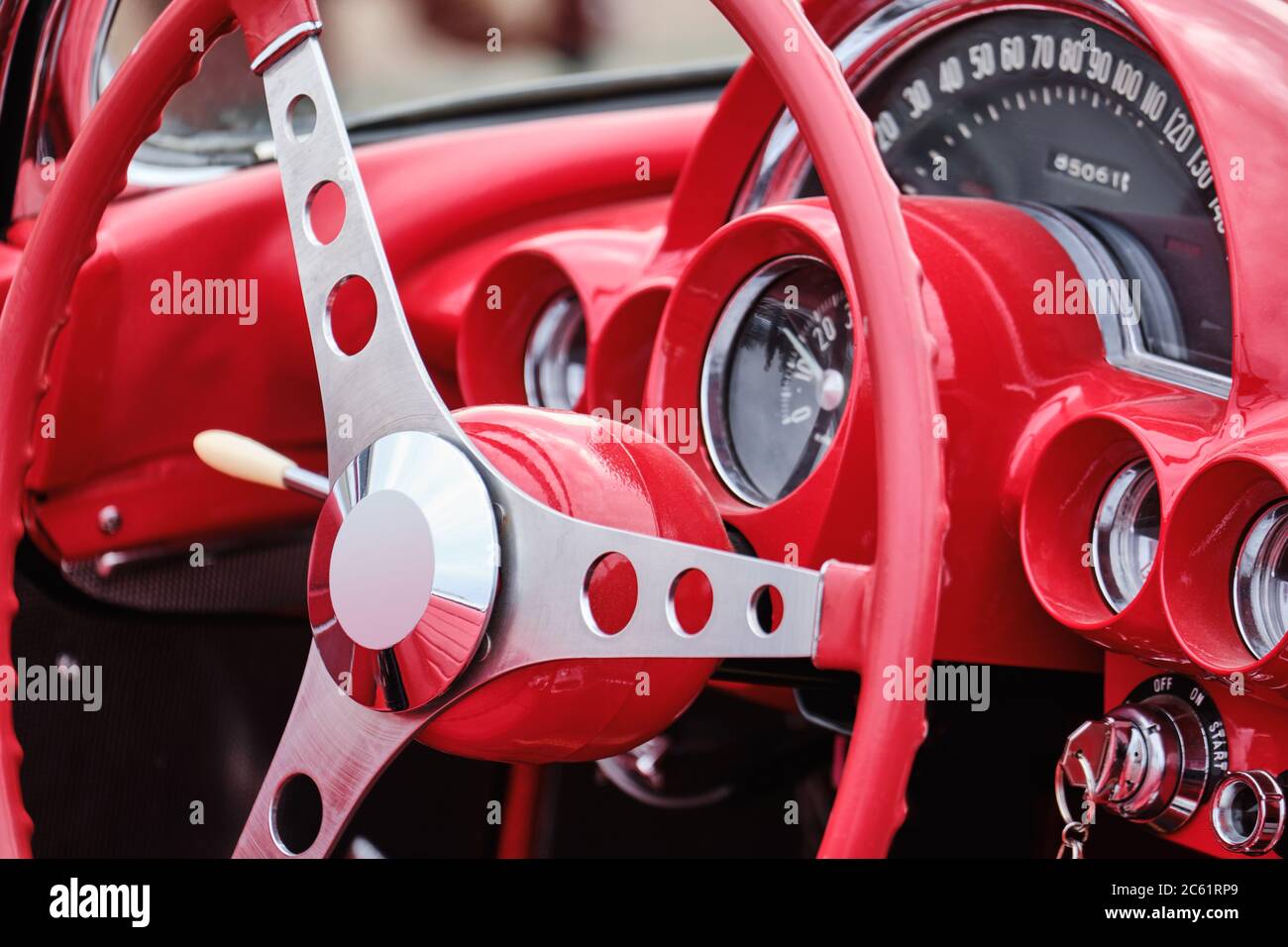 Original red steering wheel in a retro car. Red color dashboard Stock ...