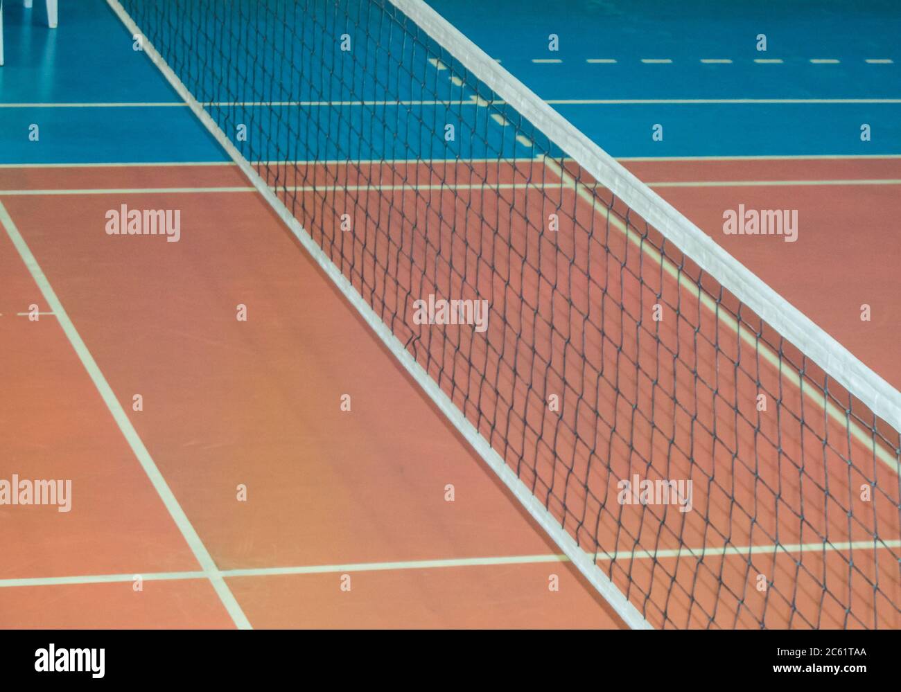 Modern empty school gym indoor with volleyball net Stock Photo - Alamy