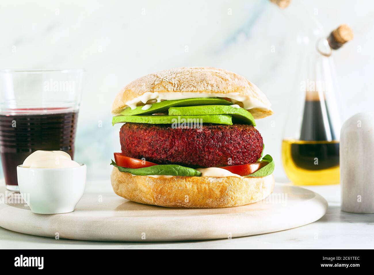 vegan burger without meat with avocado, tomatoes and spinach on the ...