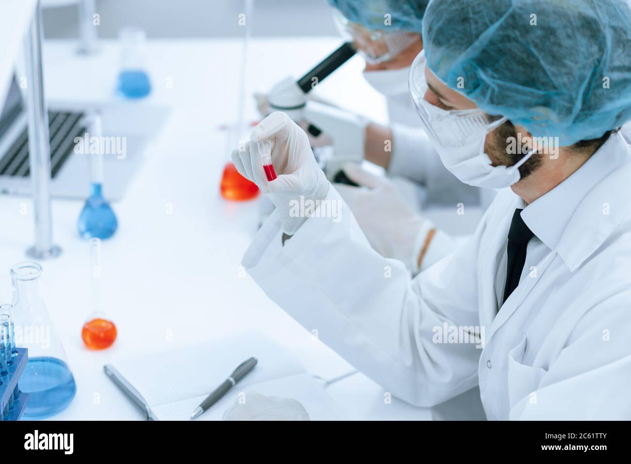 group of scientists conducts research in the laboratory Stock Photo - Alamy