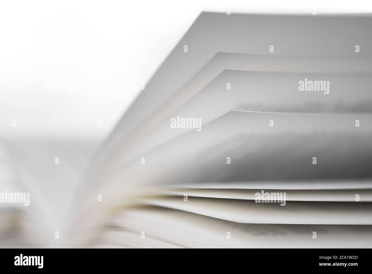 Open book with on the right side one page with a sharp edge. The other ...