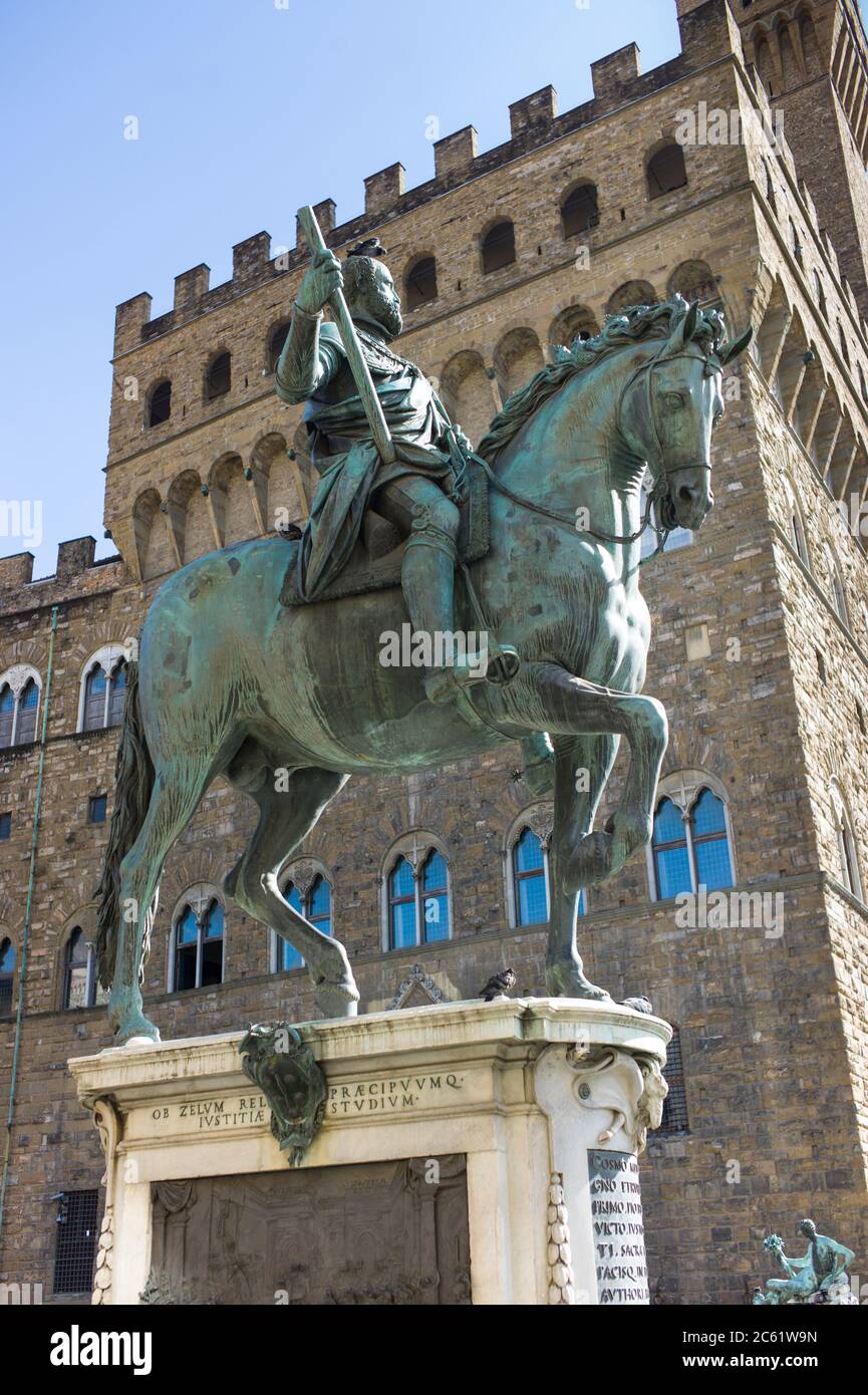 Bronze statue of Cosimo Medici sitting on a horse, in a square near the ...