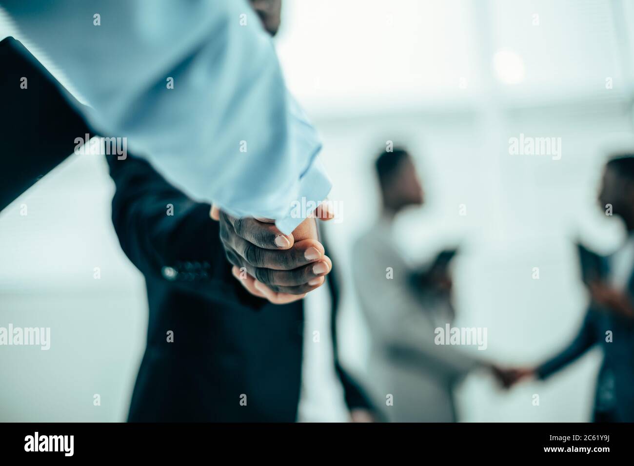 close up. image of a business handshake on an office background Stock ...