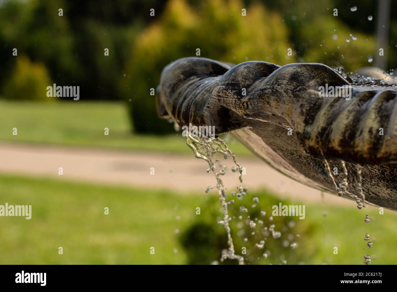 splashing water from classic fountain Stock Photo - Alamy