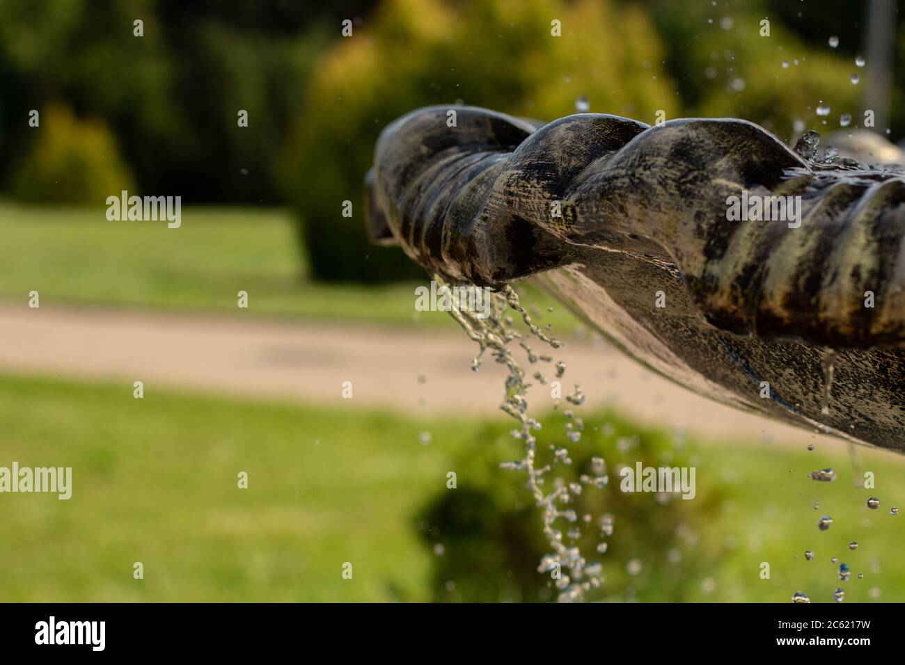 splashing water from classic fountain Stock Photo - Alamy