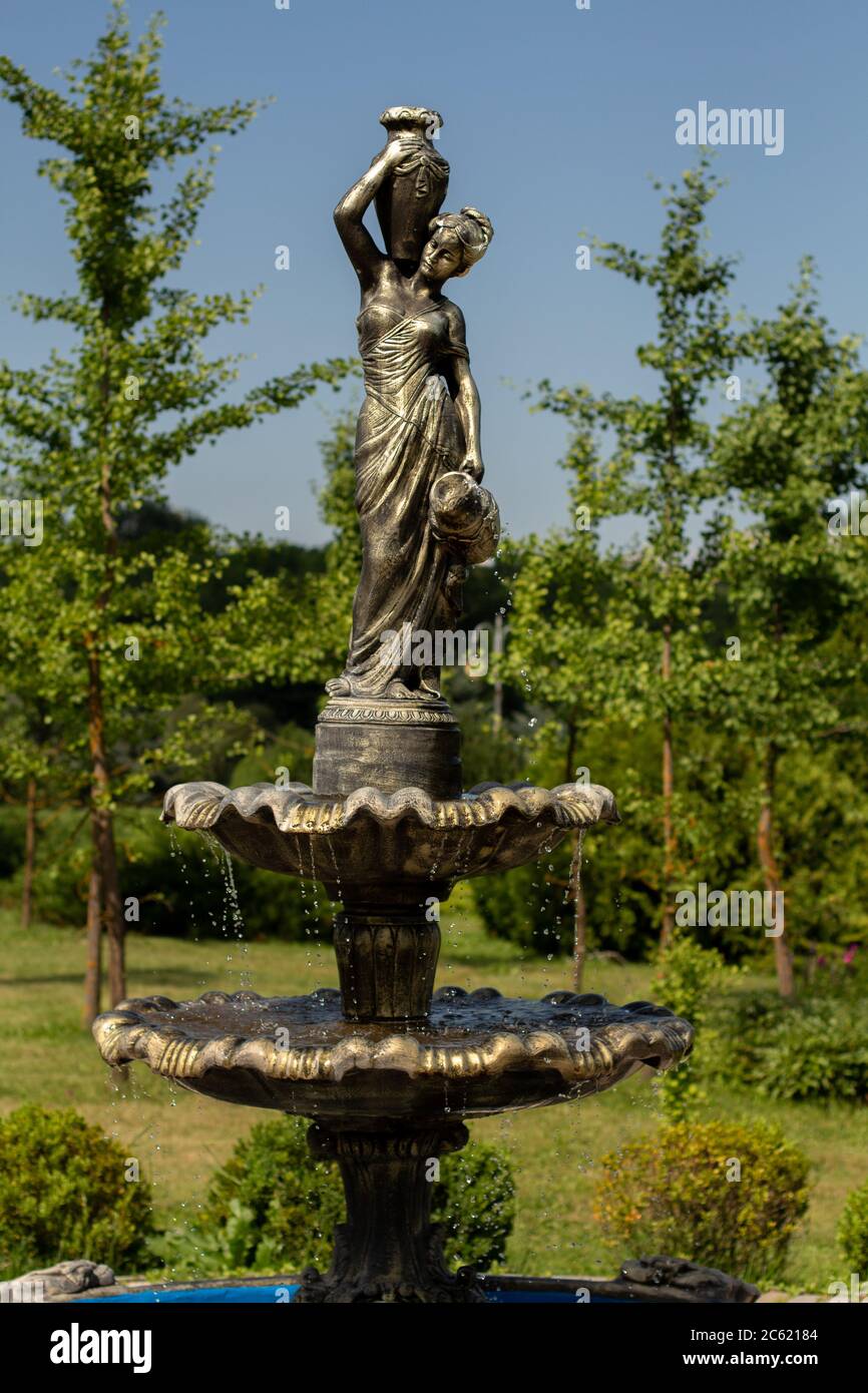 beautiful fountain statue in park Stock Photo - Alamy