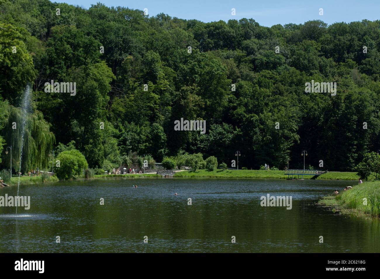 a large beautiful lake with green landscape Stock Photo - Alamy