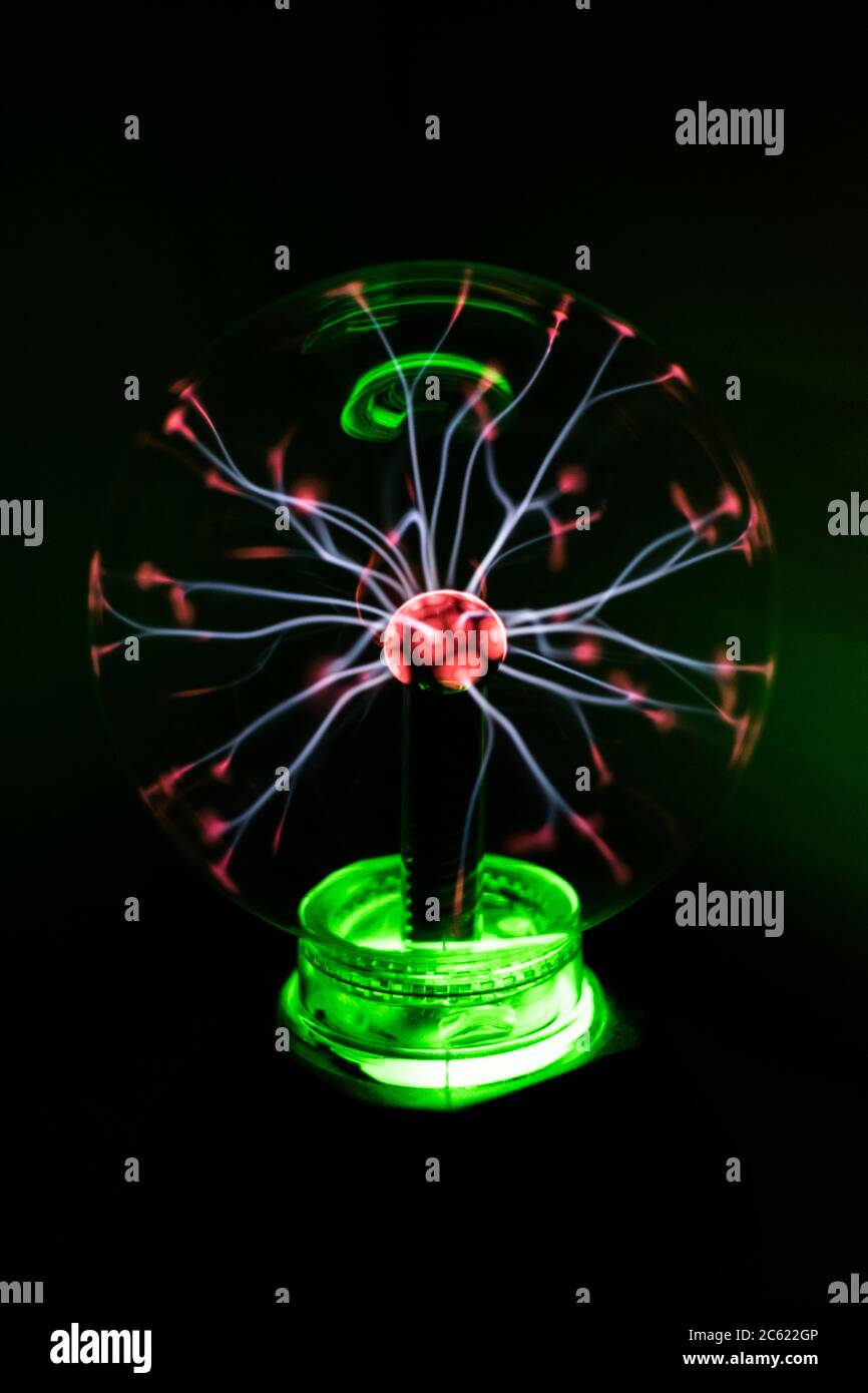 Plasma ball lit with stunning colors Stock Photo - Alamy